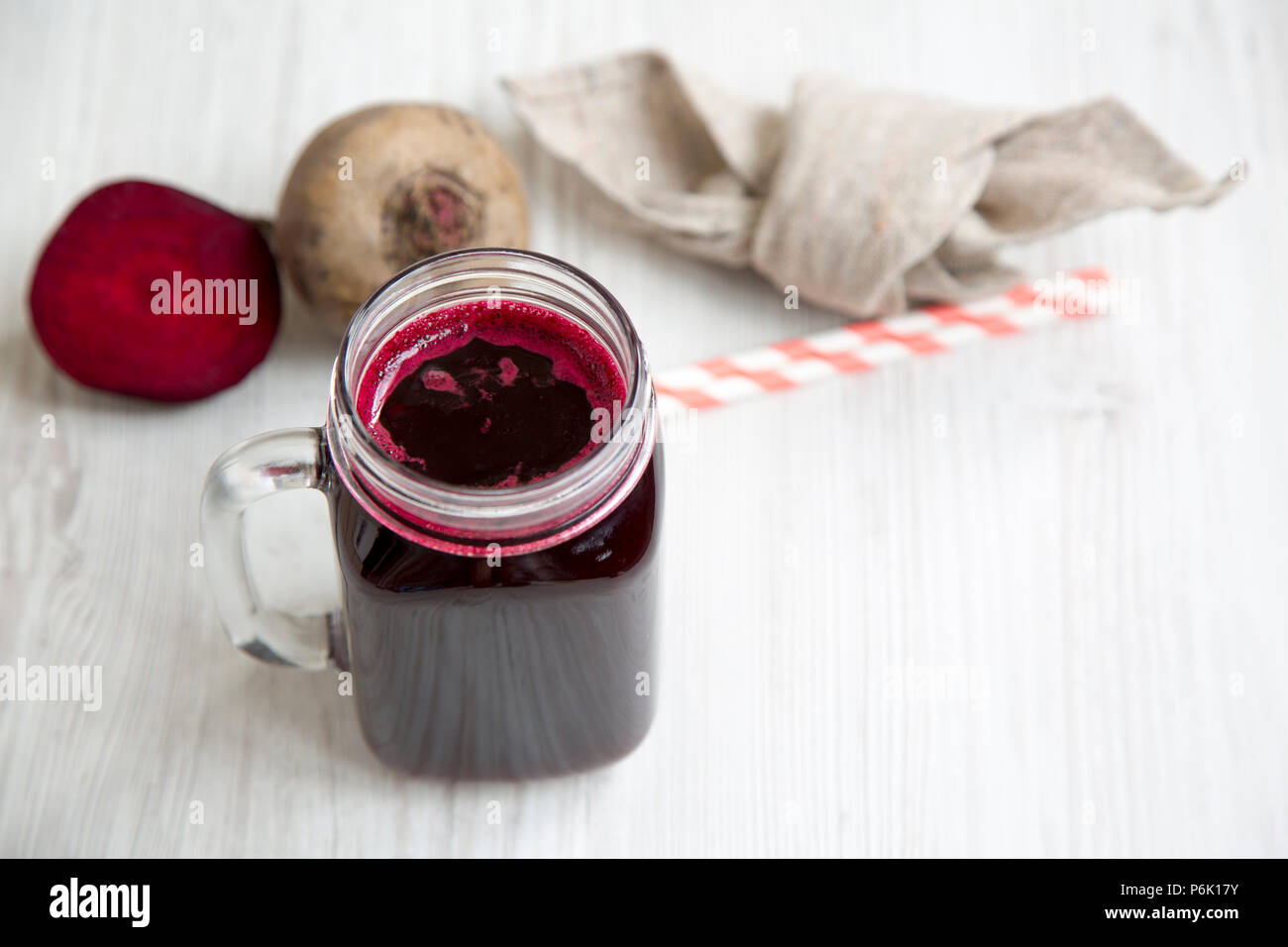 Beetroot juice in glass jar, side view Stock Photo - Alamy