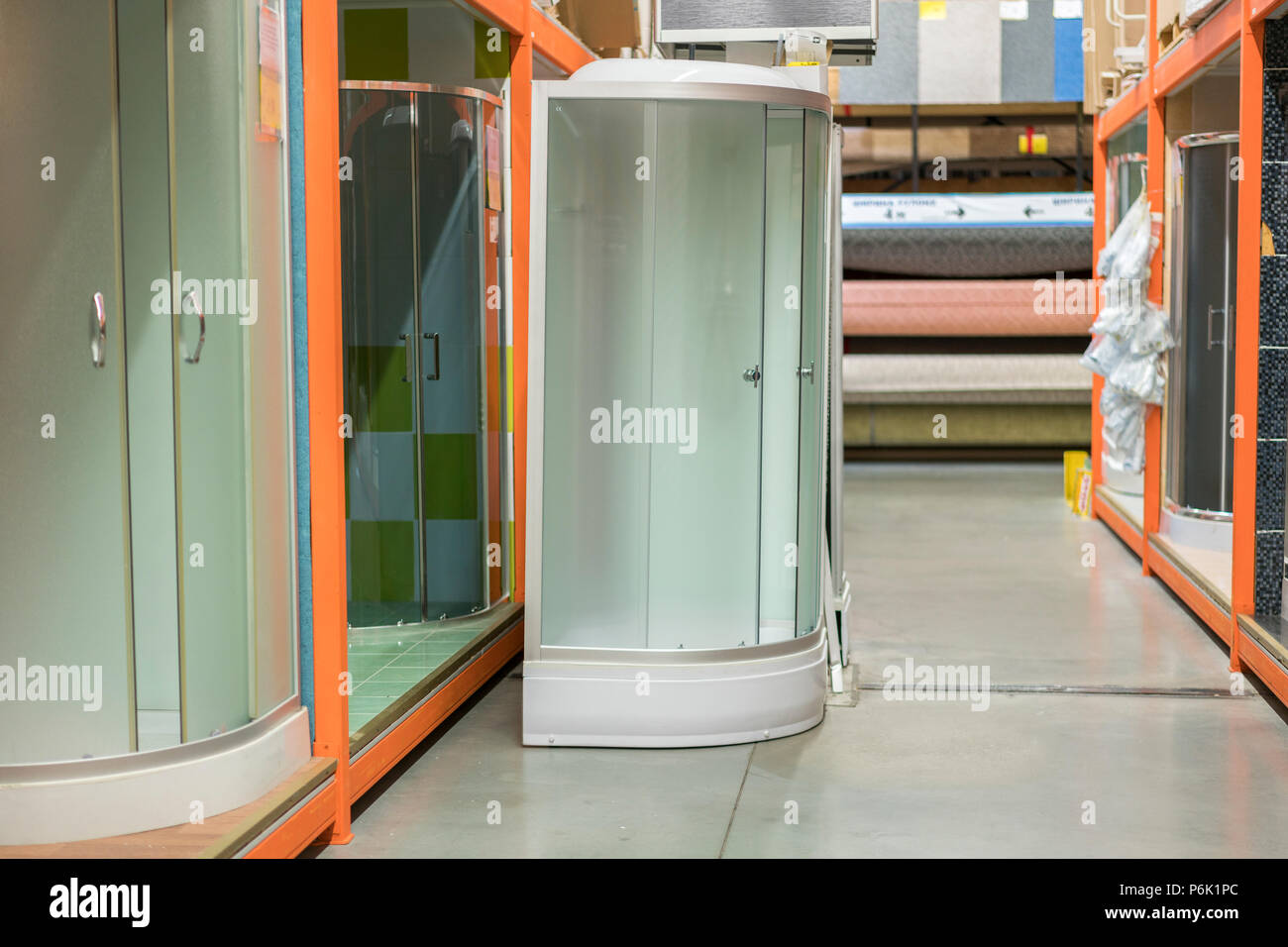 Shower cabins in the store. hardware store. Sanitary engineering shop ...