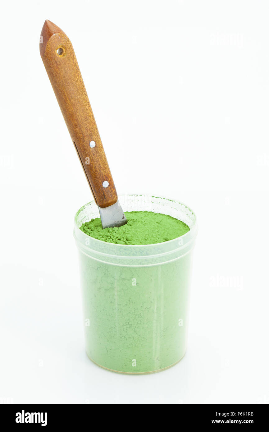 small bucket of color powder with a spatula - studio light Stock Photo ...