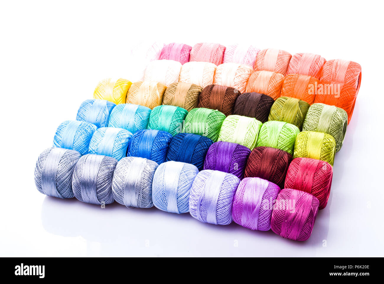 Laid out bright threads Stock Photo - Alamy