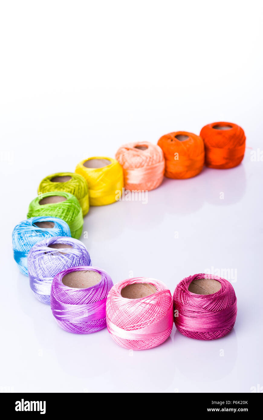 Bobbin of golden thread hi-res stock photography and images - Alamy