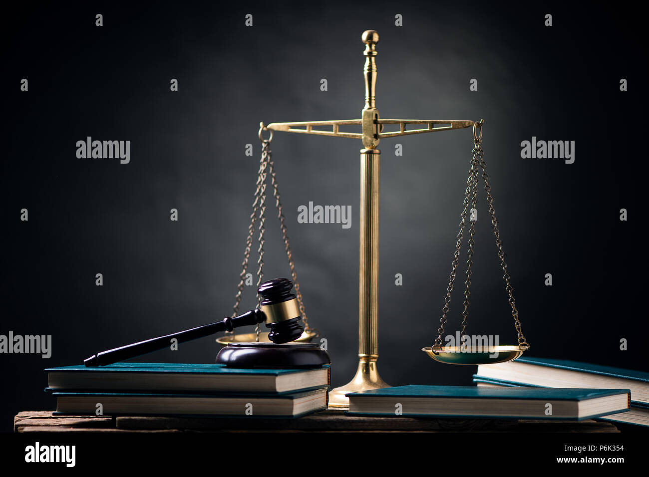 Judge gavel,scale, books on table and background Stock Photo - Alamy
