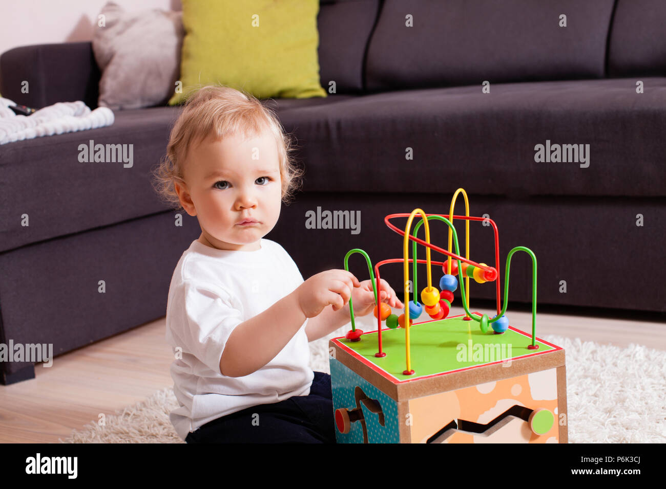 very cute boy wants to be a smart Stock Photo - Alamy