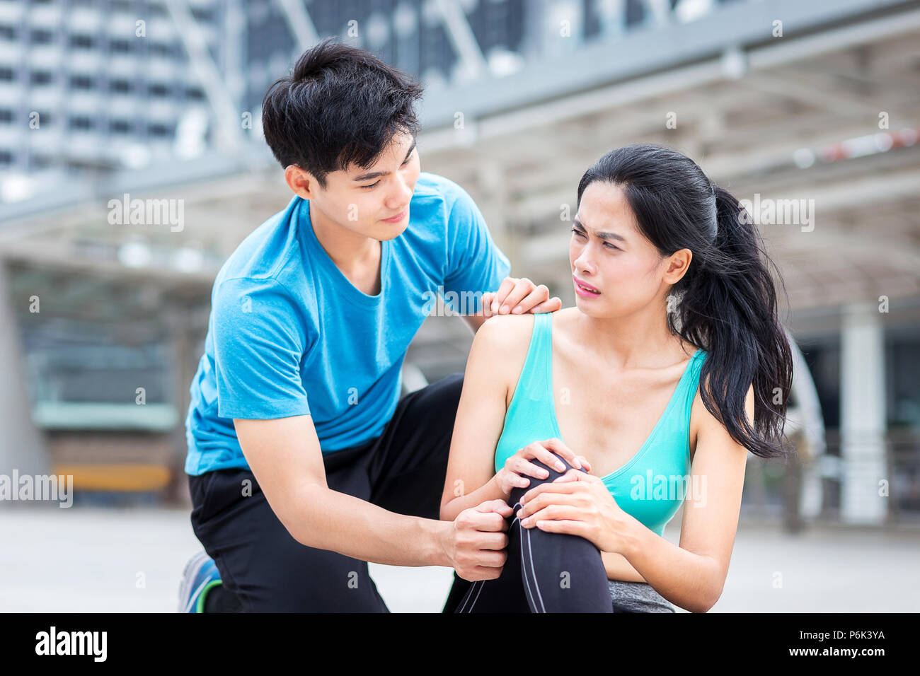 running injury, man help sport girl from ankle hurt accident from ...