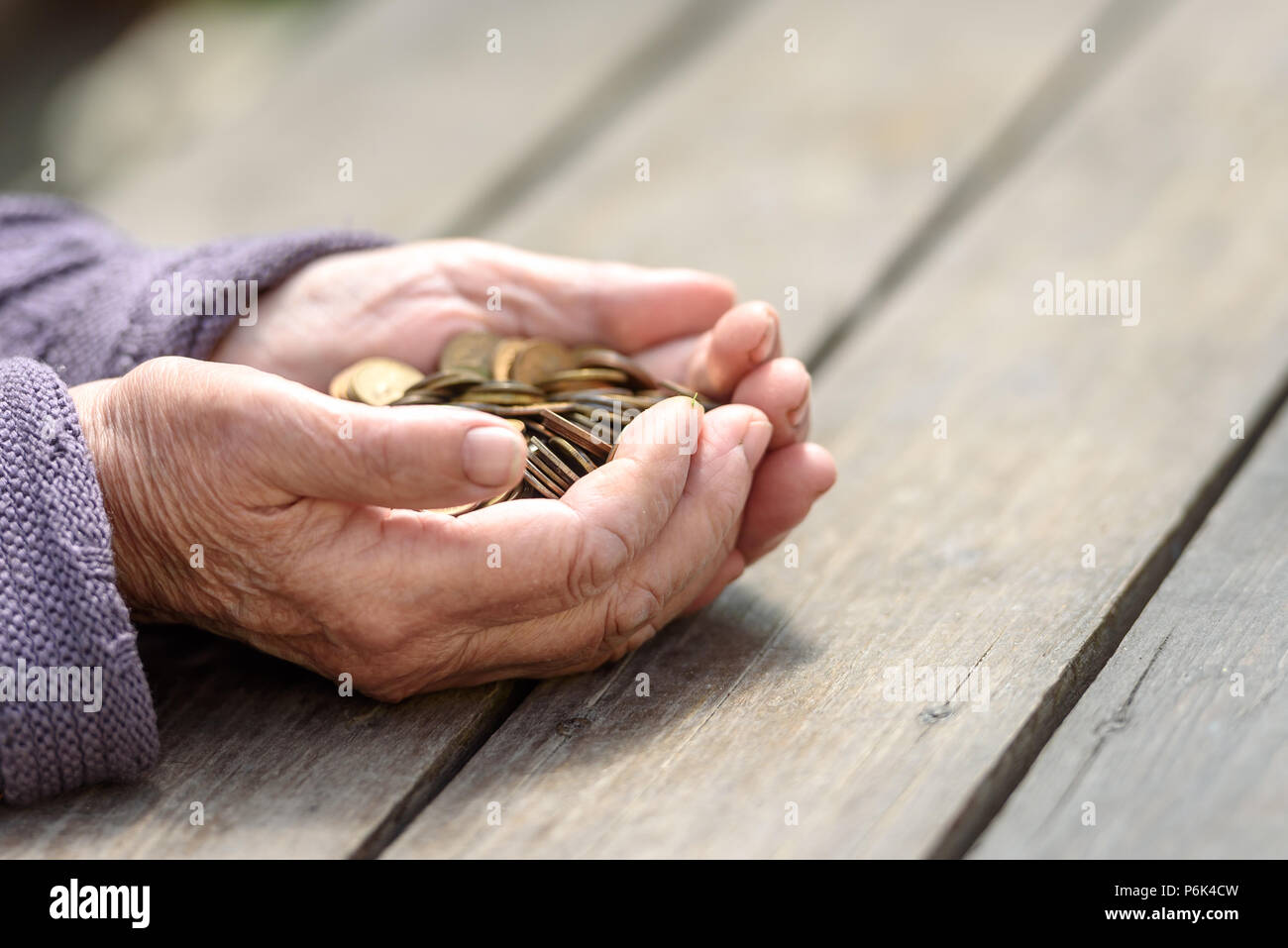 Money, coins, the grandmother on pension and the concept of life ...