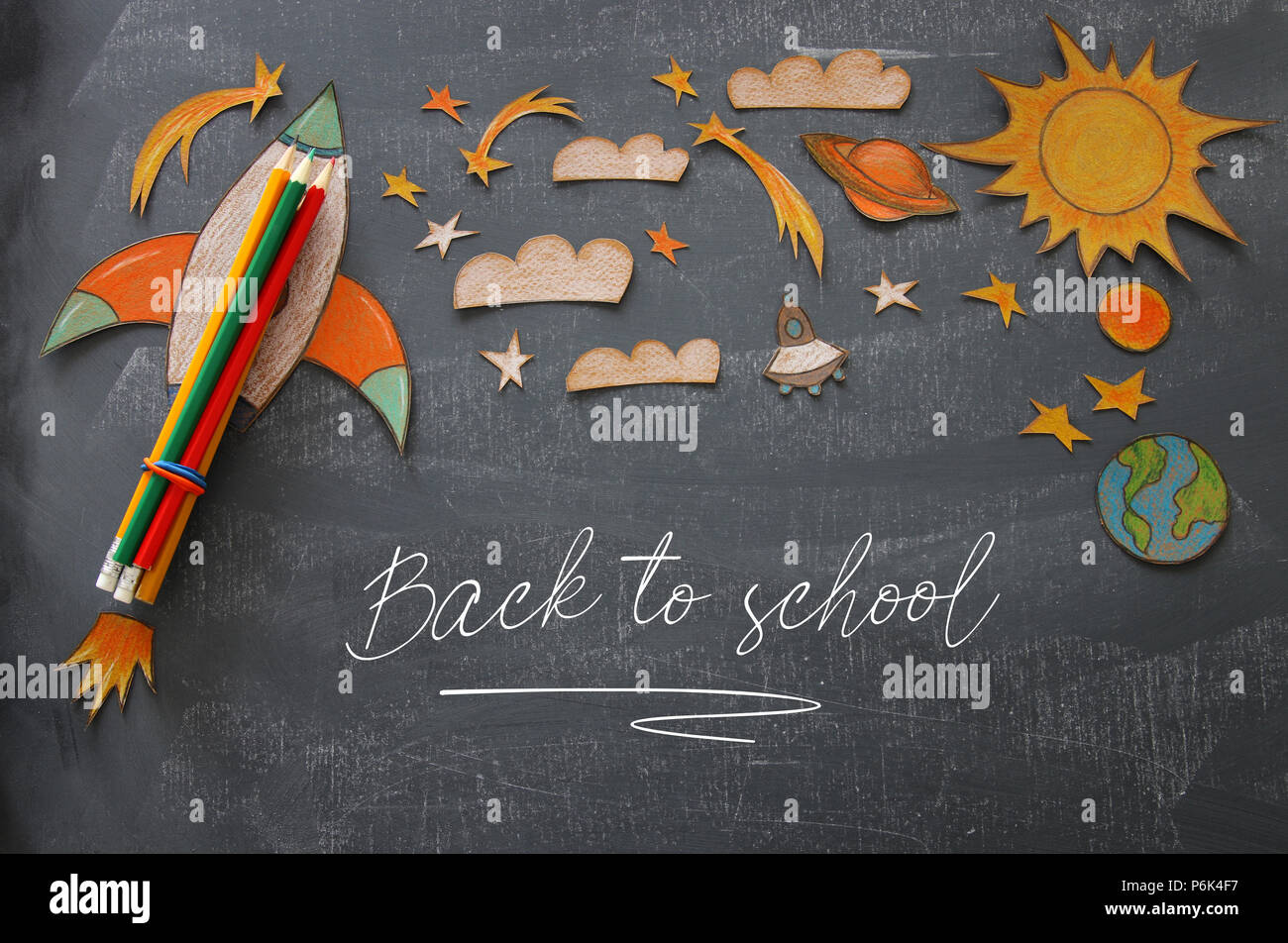 Back to school concept. rocket, space elements shapes cut from paper ...