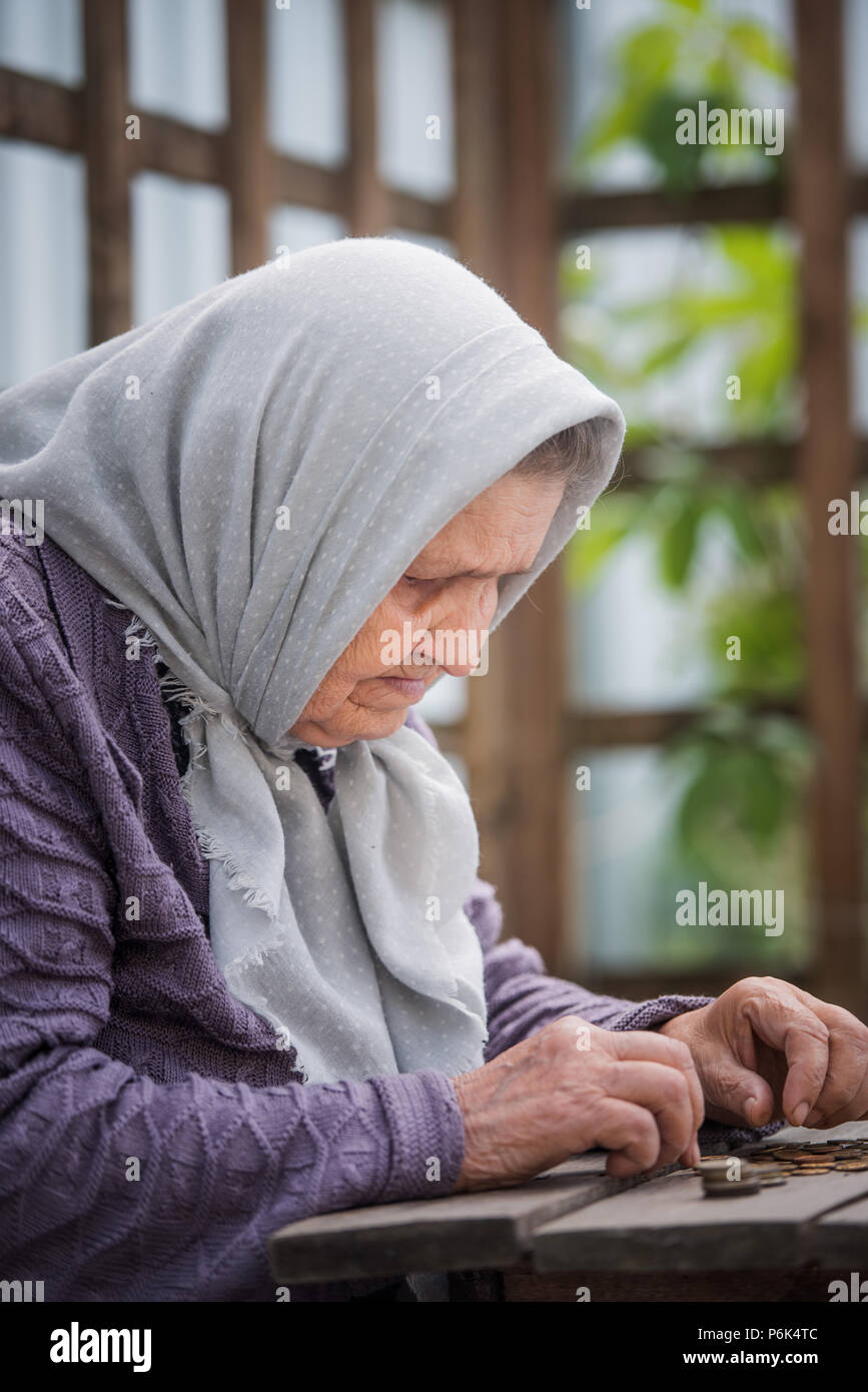 Money, coins, retired grandmother and the concept of a living wage ...