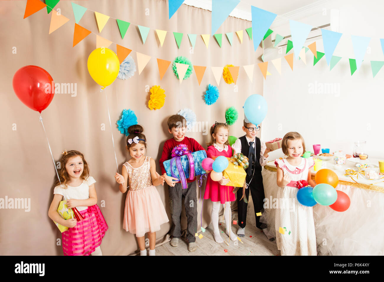happy kids came to the birthday party Stock Photo - Alamy