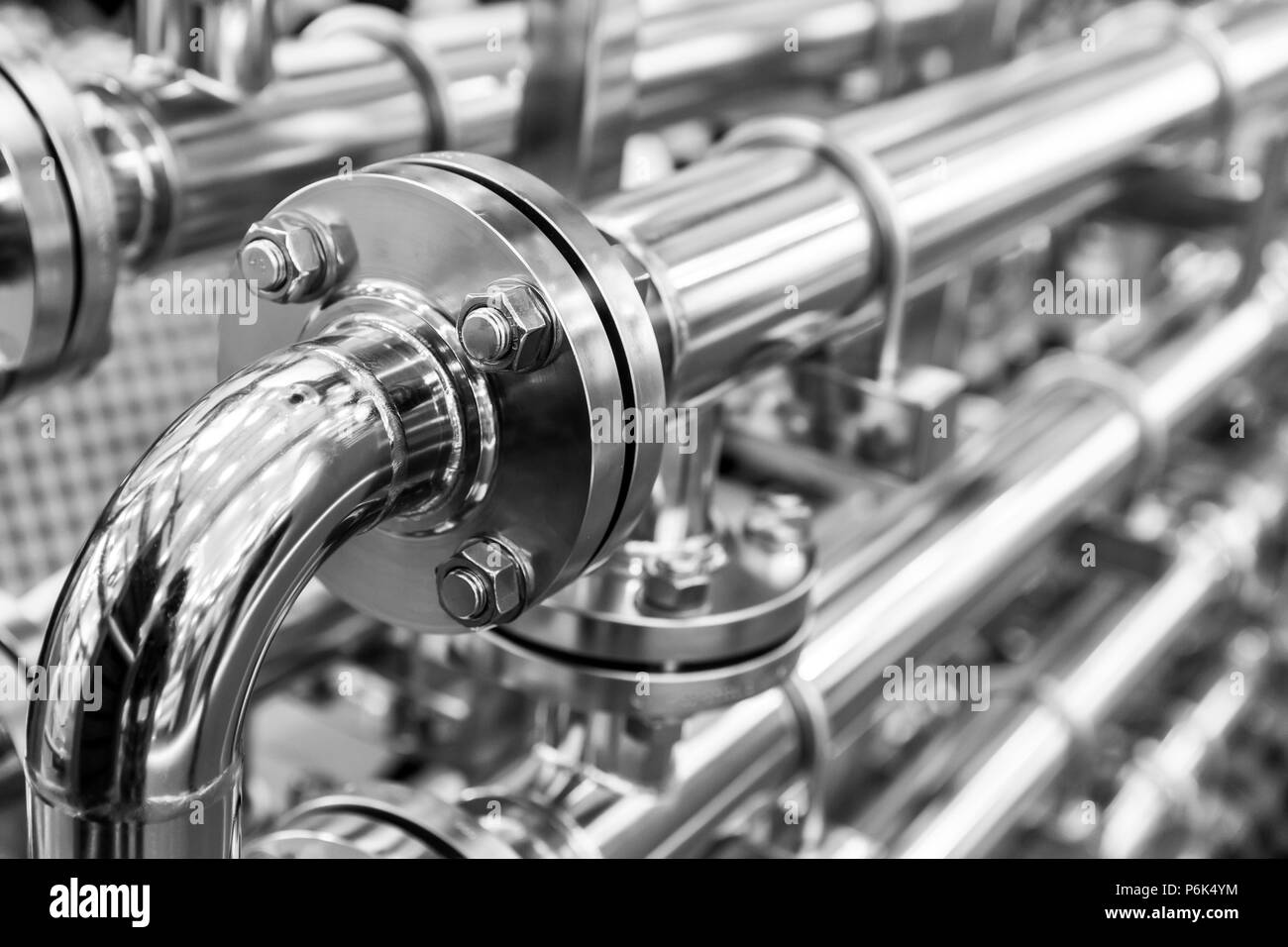 Steel water pipeline, chrome pipes, closeup. Reliable plumbing ...