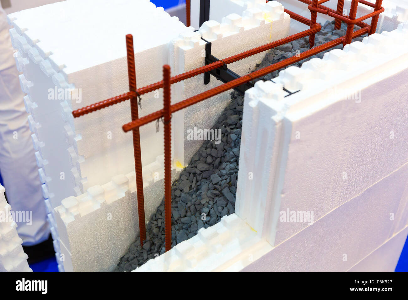 Wall construction of permanent formwork, cut view. Foam, rebar and ...