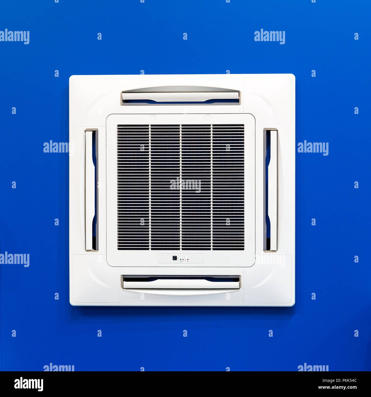 Ceiling air conditioner, split system installed on blue background ...