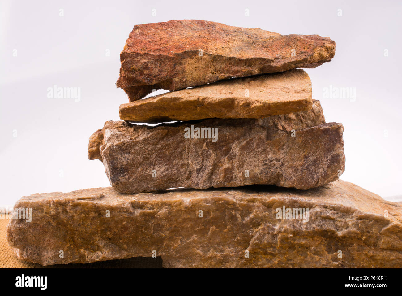 Rocks overlapped on a white background Stock Photo - Alamy