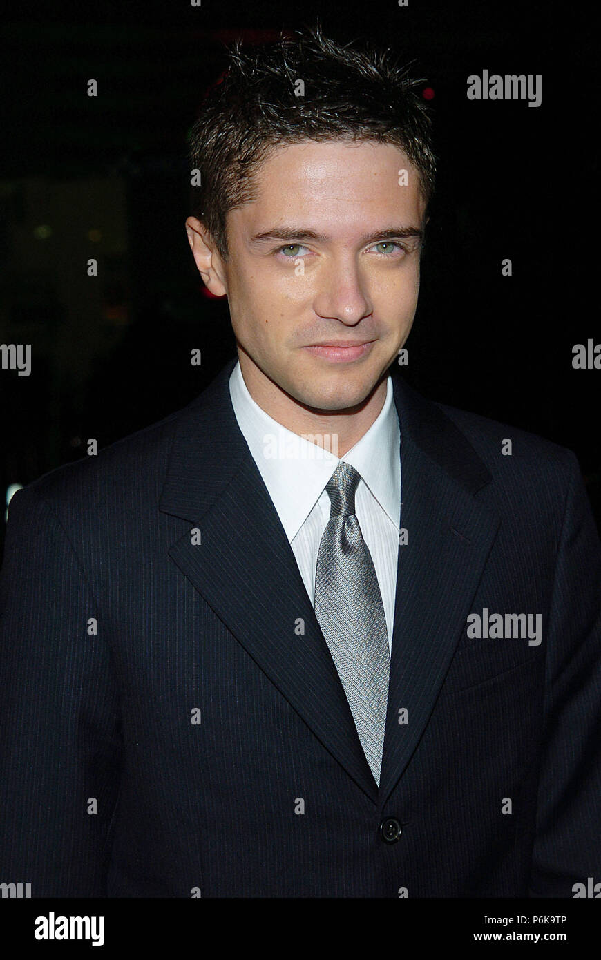 Topher Grace arriving at the Good Company Premiere at the Chinese ...