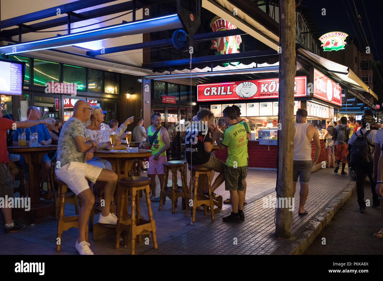 Seniors Germans couple of tourists in brasserie, Mallorca tourism, El ...