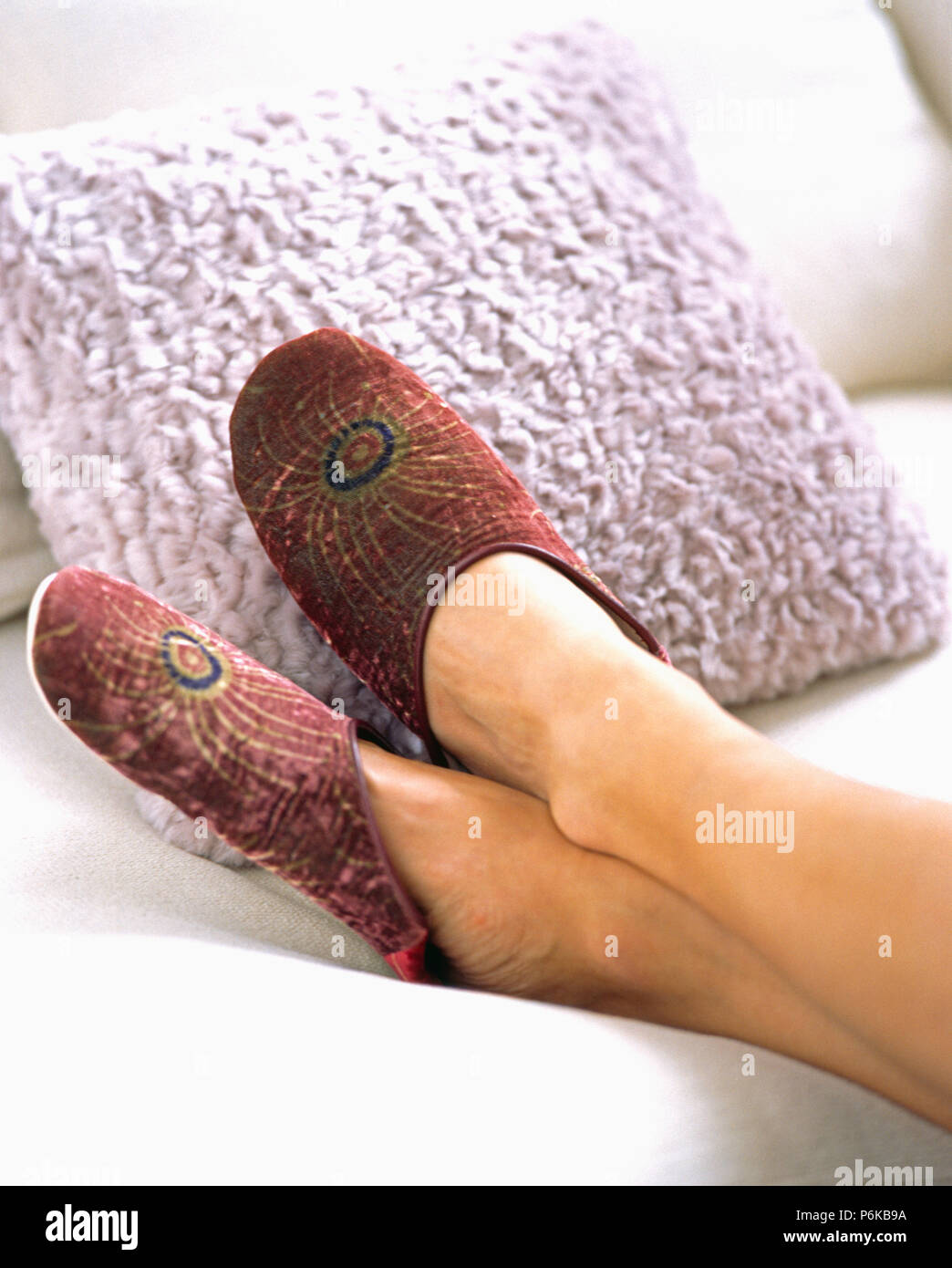 Close-up of feet wearing brown backless slippers FOR EDITORIAL USE ONLY ...