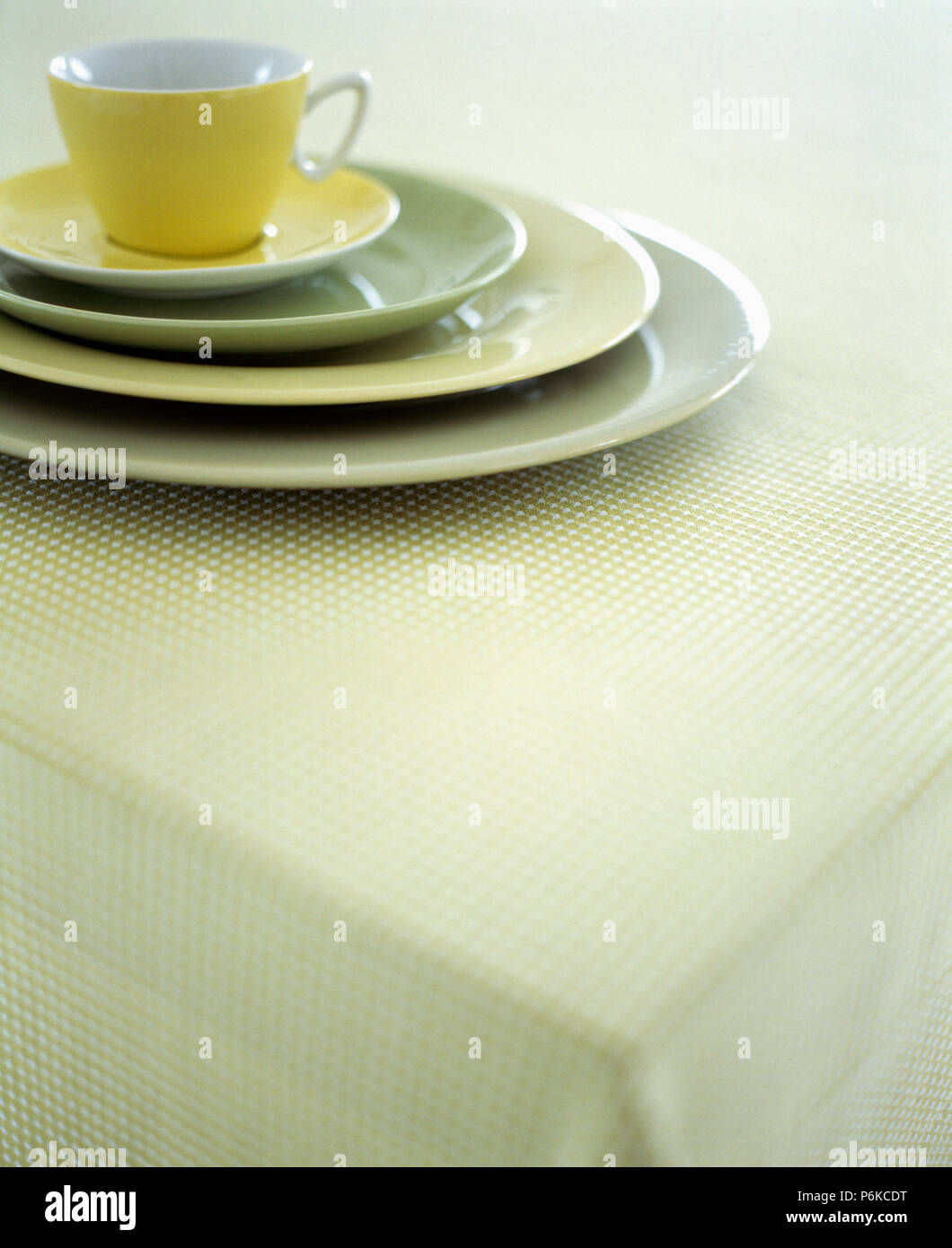 Yellow cup and saucer hi-res stock photography and images - Alamy