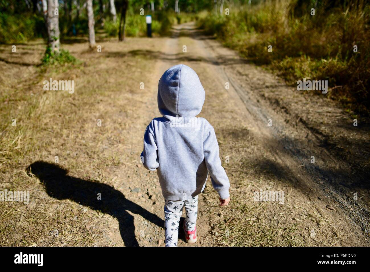 School girl walking from behind hi-res stock photography and images - Alamy