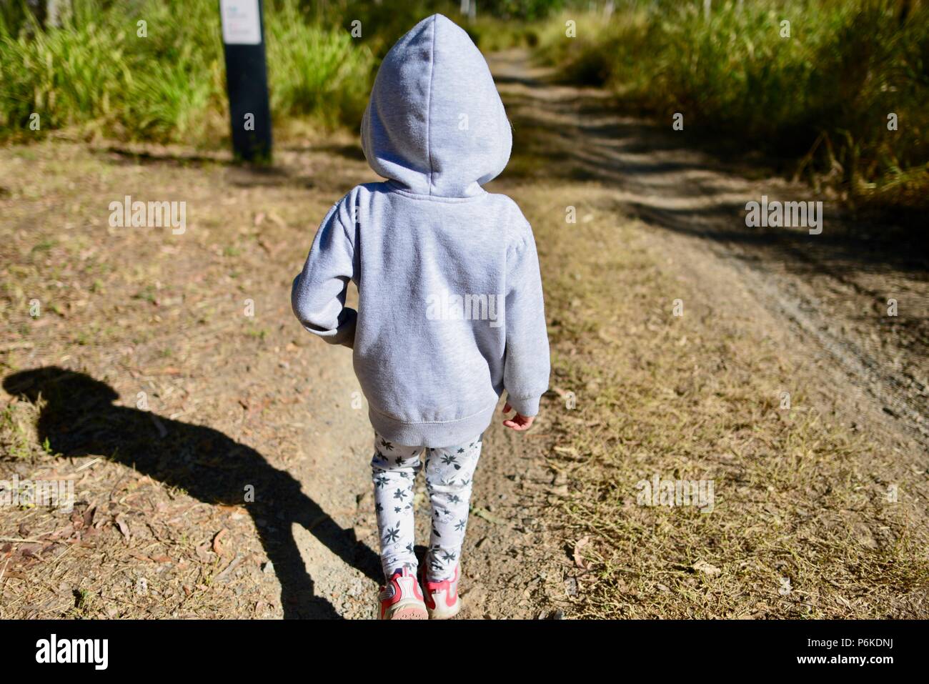 School girl walking from behind hi-res stock photography and images - Alamy