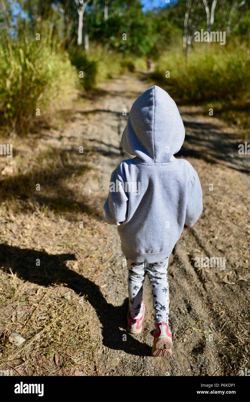 School girl walking from behind hi-res stock photography and images - Alamy