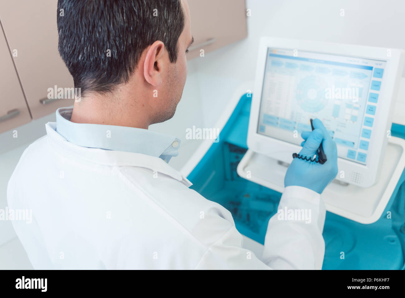 Doctor preparing a blood count in the laboratory Stock Photo - Alamy