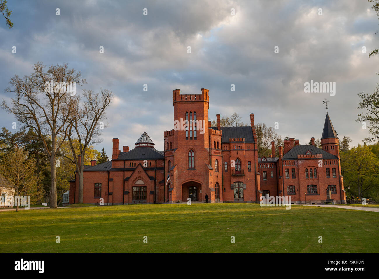 Old red brick manor house in the style of English castles. Sangaste ...