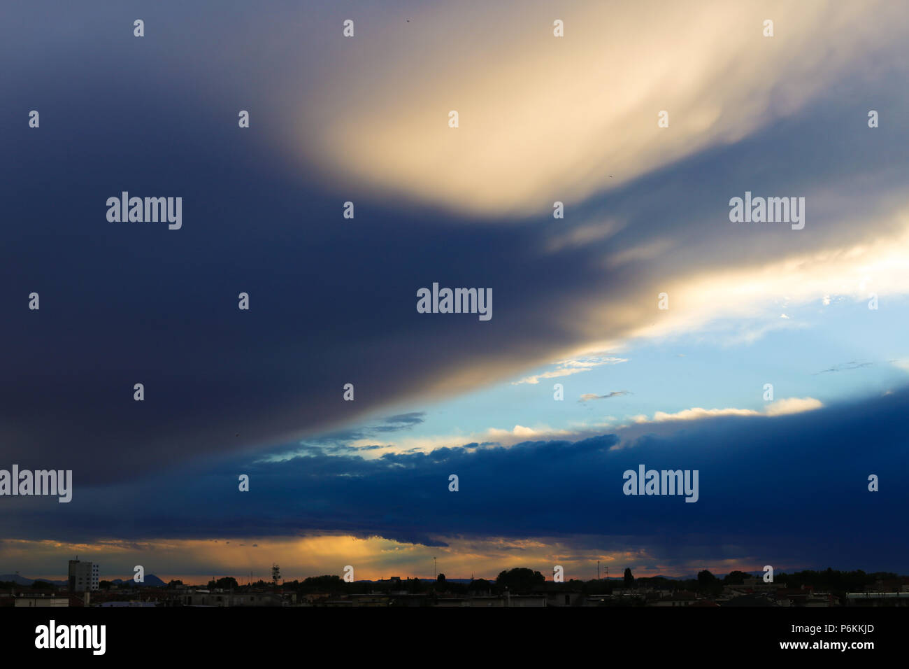 Amazing skyscape and cityscape in sunset sky background Stock Photo - Alamy