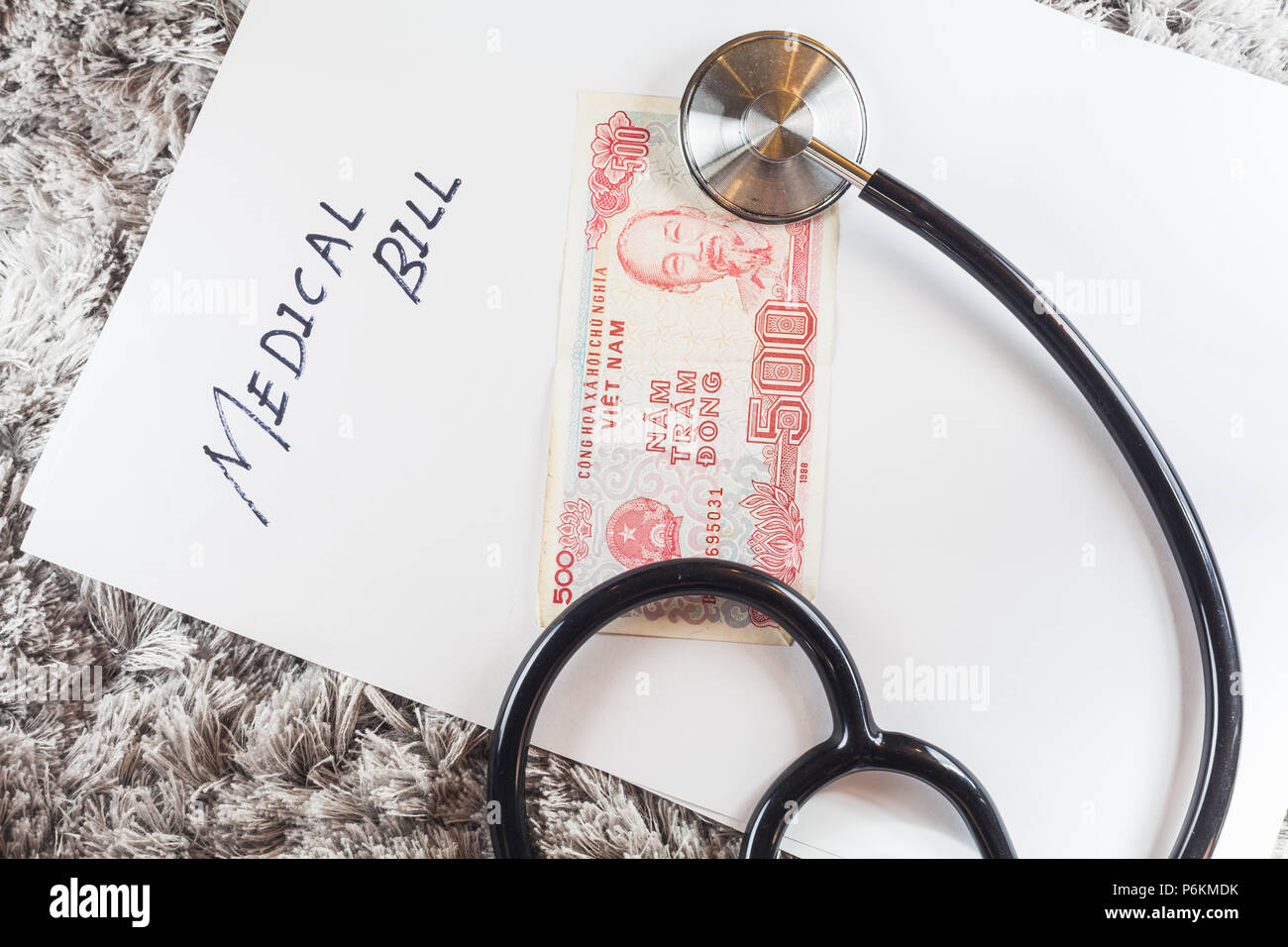 Stethoscope with wording of "Medical Bill" showing expensive healthcare ...