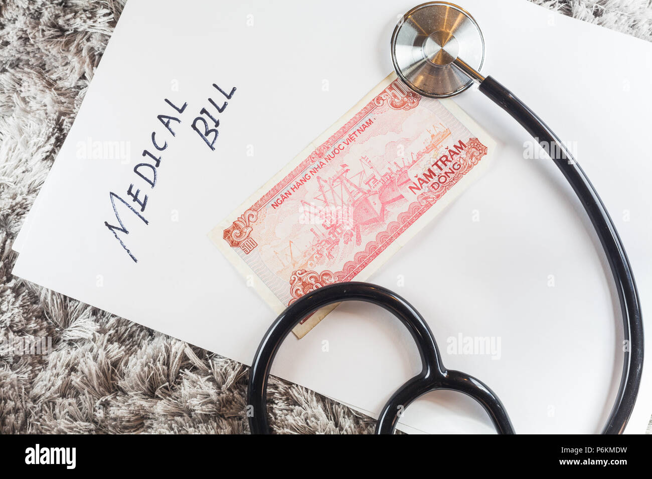 Stethoscope with wording of "Medical Bill" showing expensive healthcare ...