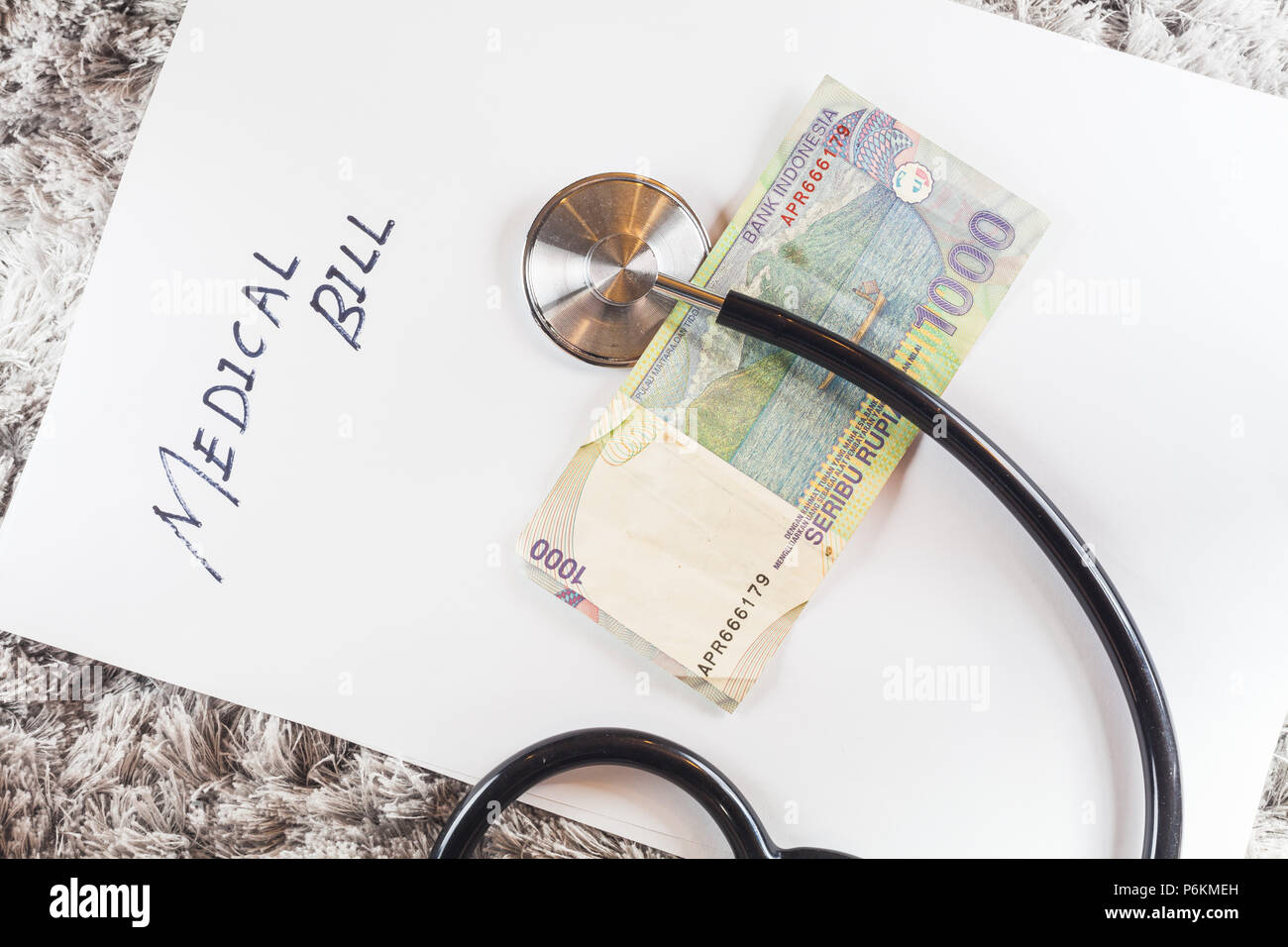 Stethoscope with wording of "Medical Bill" showing expensive healthcare ...