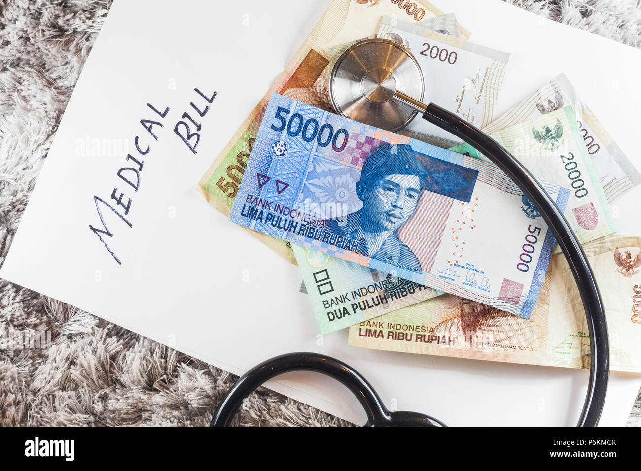 Stethoscope with wording of "Medical Bill" showing expensive healthcare ...