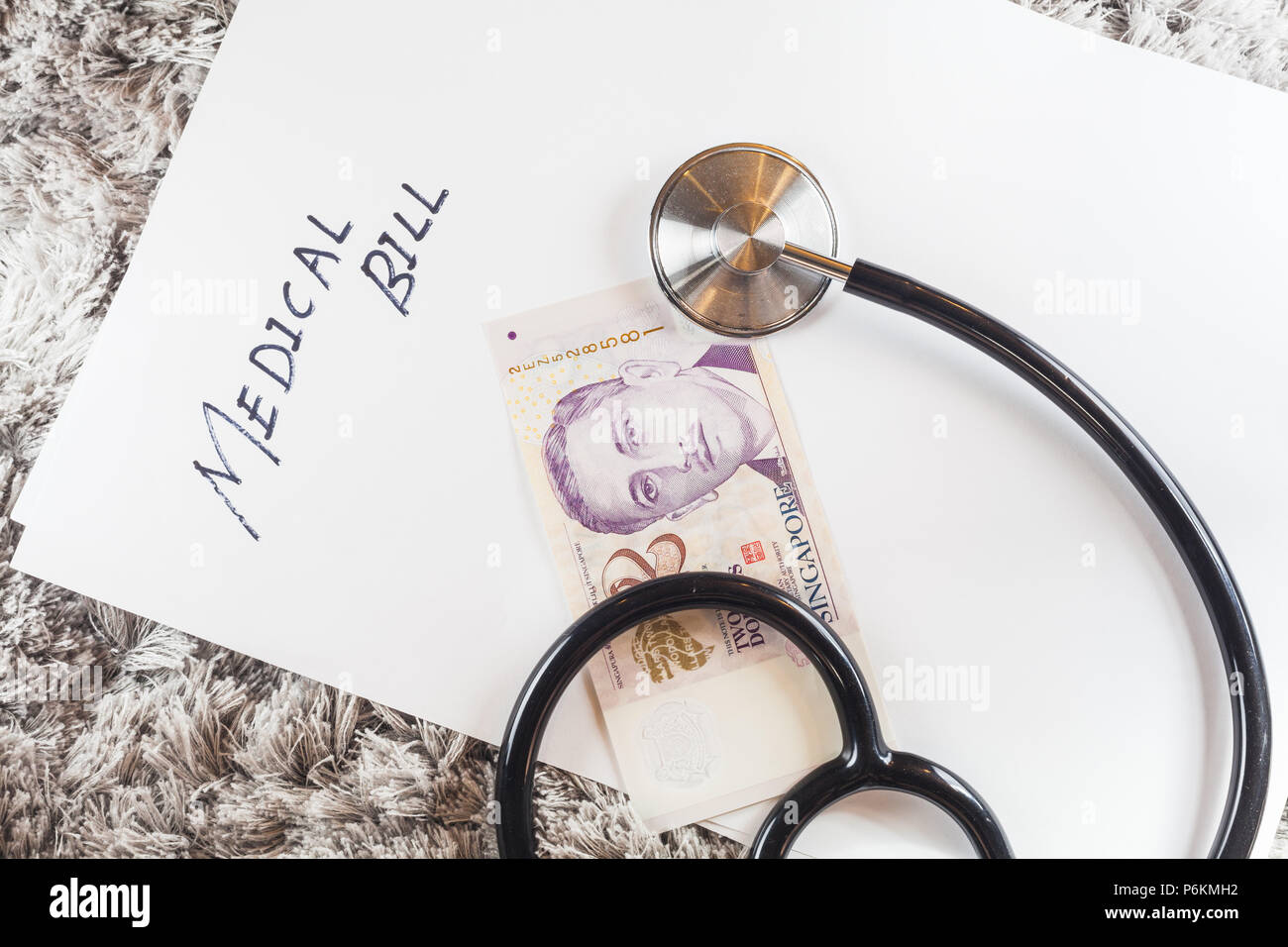 Stethoscope with wording of "Medical Bill" showing expensive healthcare ...