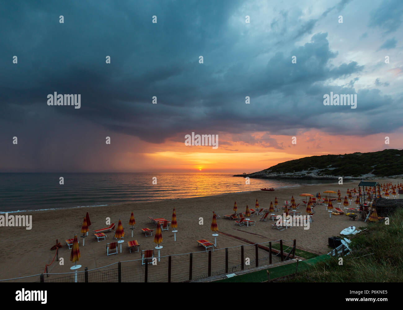 Summer evening sunset Spiaggia di Sfinale Adriatic Sea beach (Vieste ...