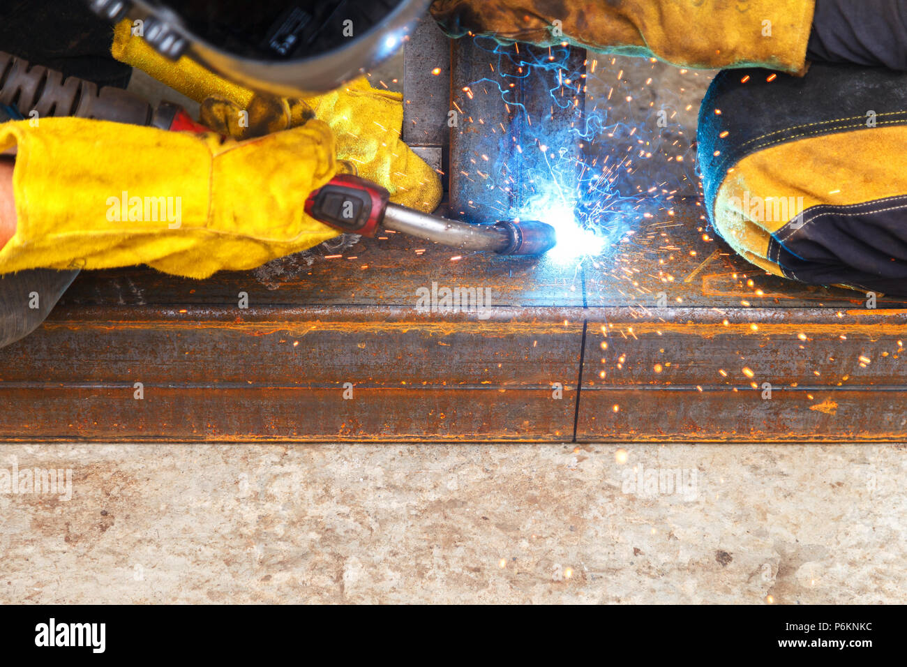 Welding work, welder welding metal material in heavy industry ...