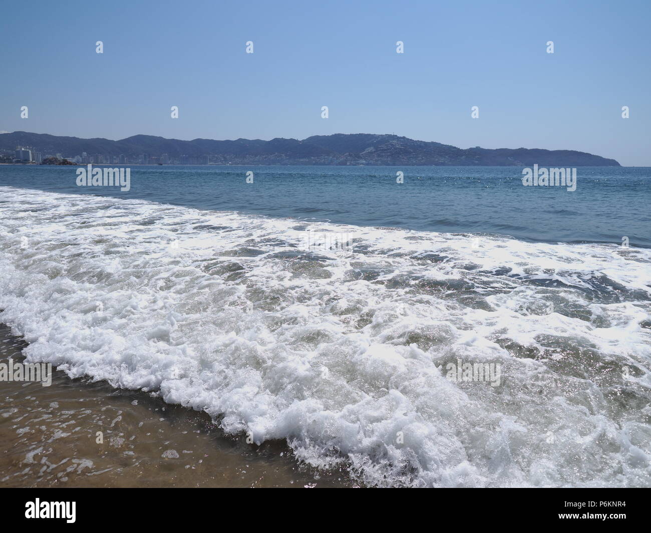 Awesome view of sandy beach at bay of ACAPULCO city in Mexico with ...
