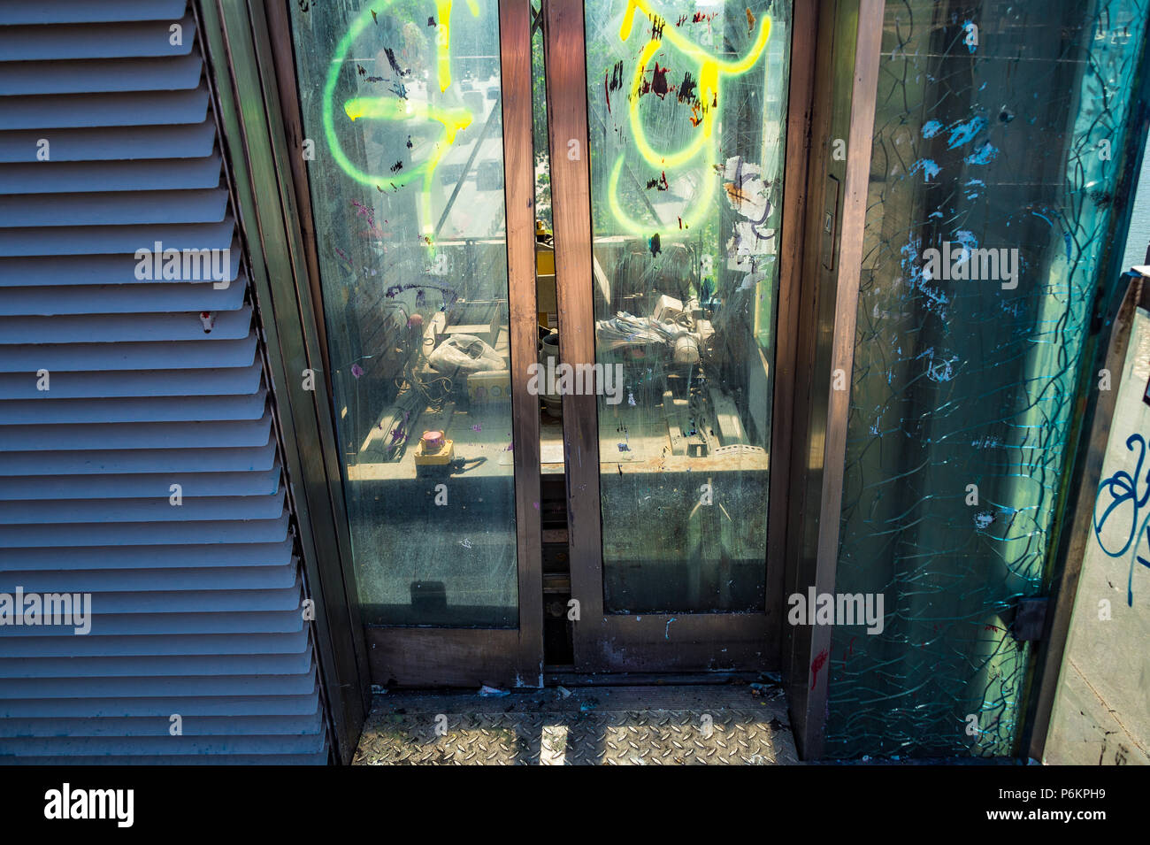 Damaged elevator with graffiti in Paris, France Stock Photo - Alamy