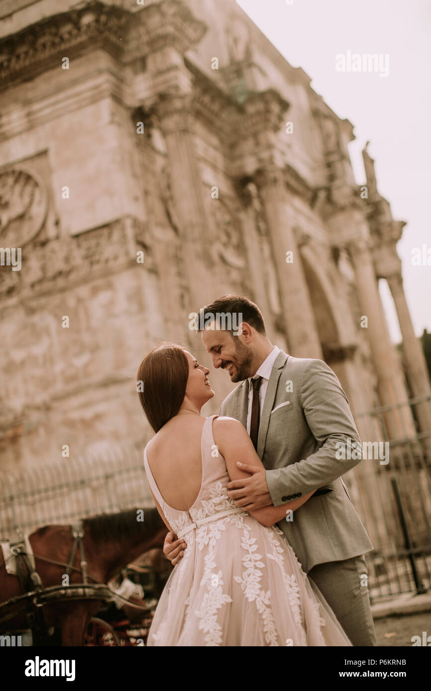 Couple holding hands in rome hi-res stock photography and images - Alamy
