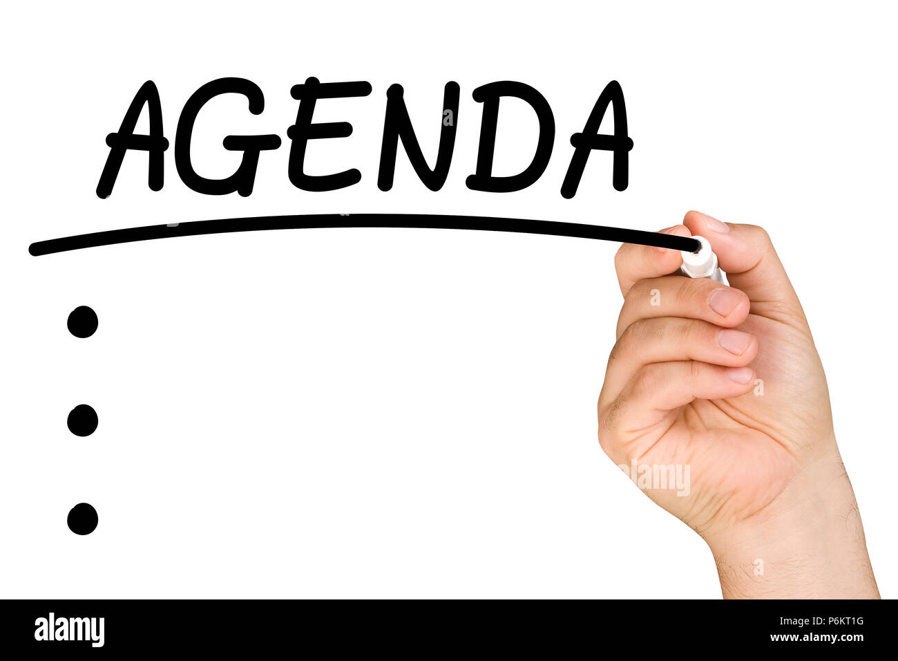 hand underlining agenda text with black felt tip or marker on a clear ...