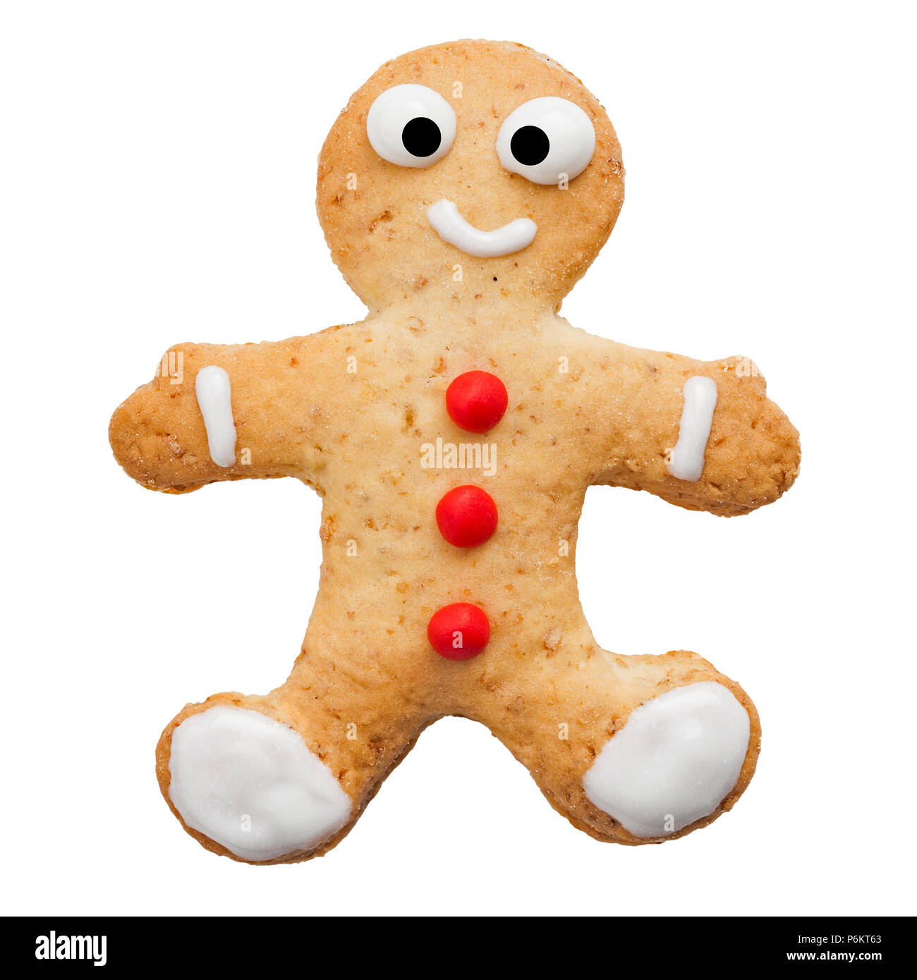 Home made happy human shaped biscuit with red buttons isolated white ...