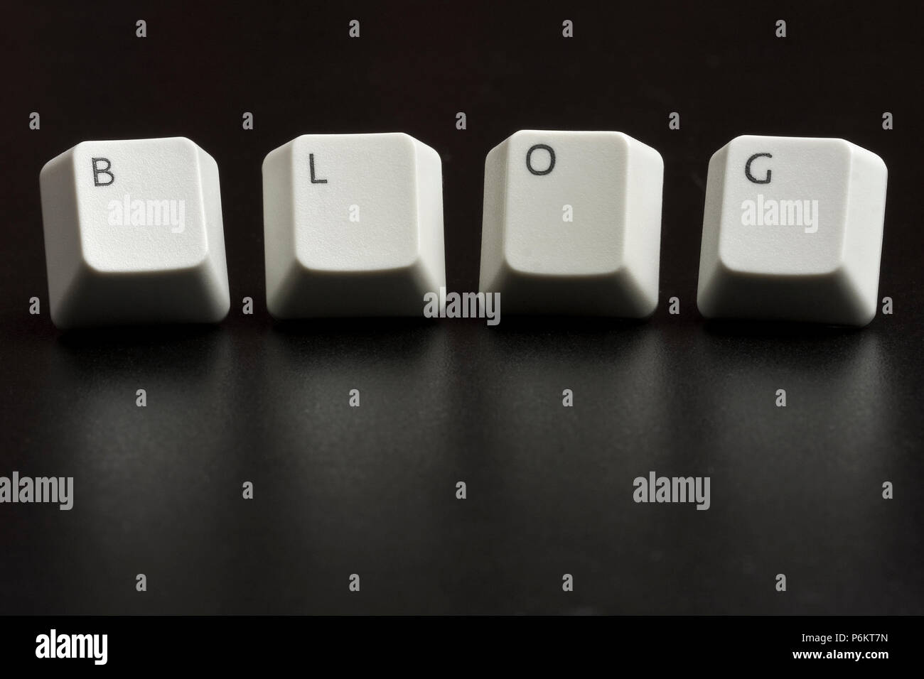 Blog word formed with real white keyboard keys on black background ...