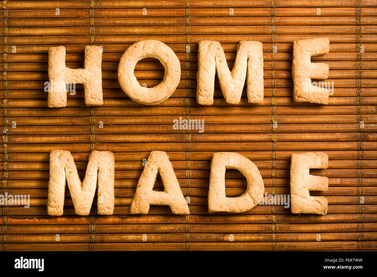 Home Made words composed of homemade biscuits letters arranged on ...