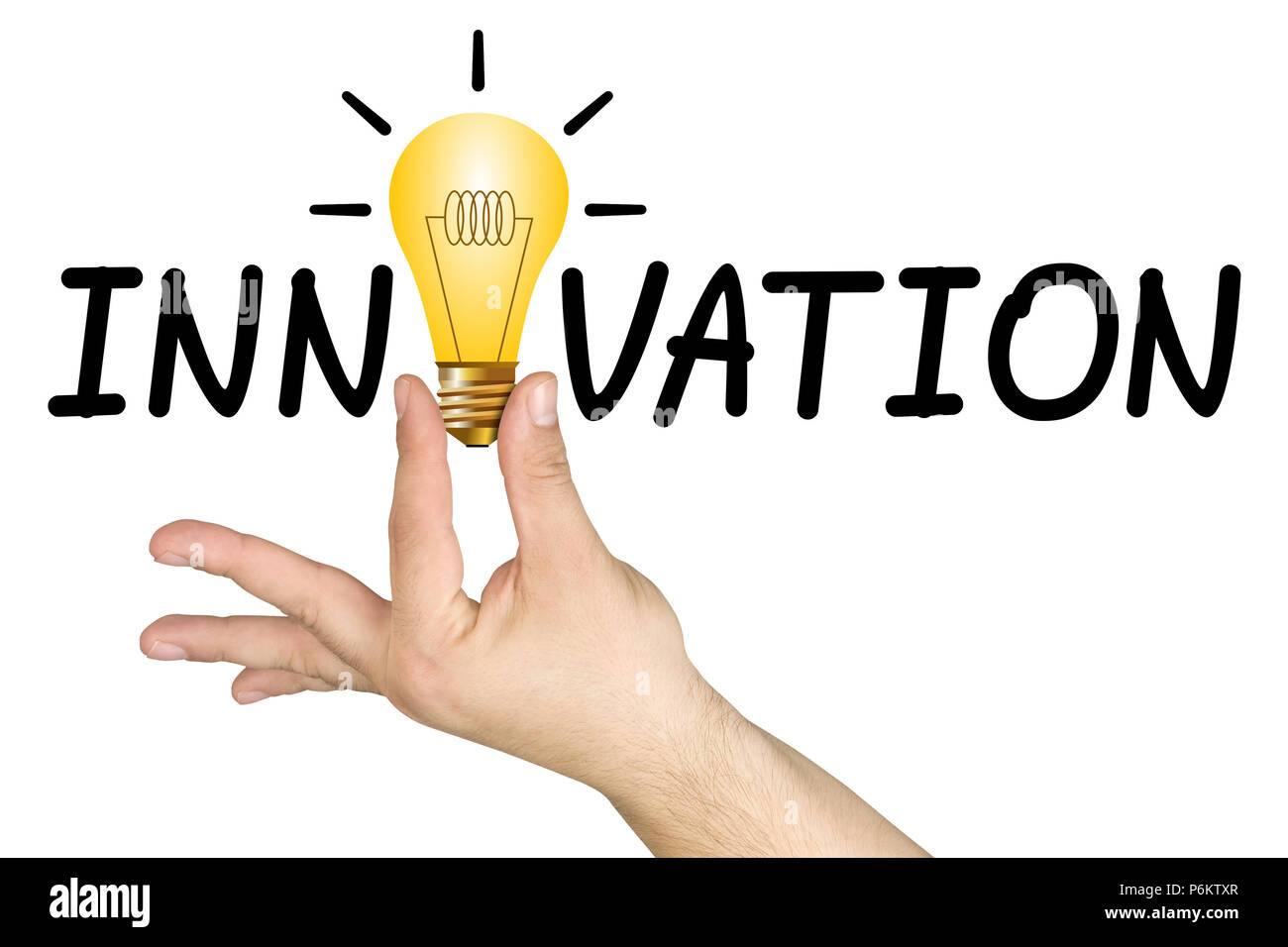 Hand holding drawn light bulb among letters of innovation word isolated ...