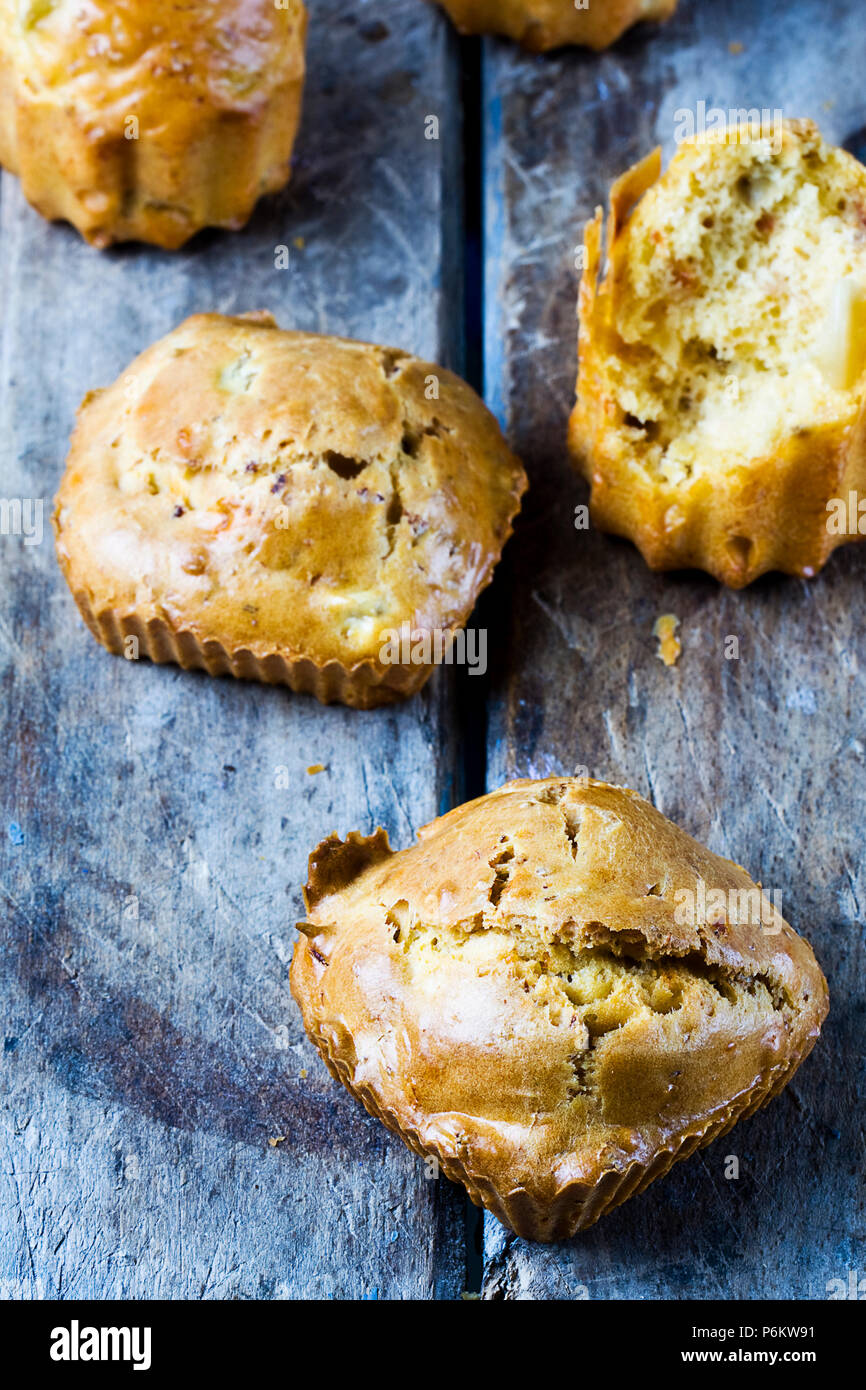 Delicious salty muffins on wooden rustic table Stock Photo - Alamy
