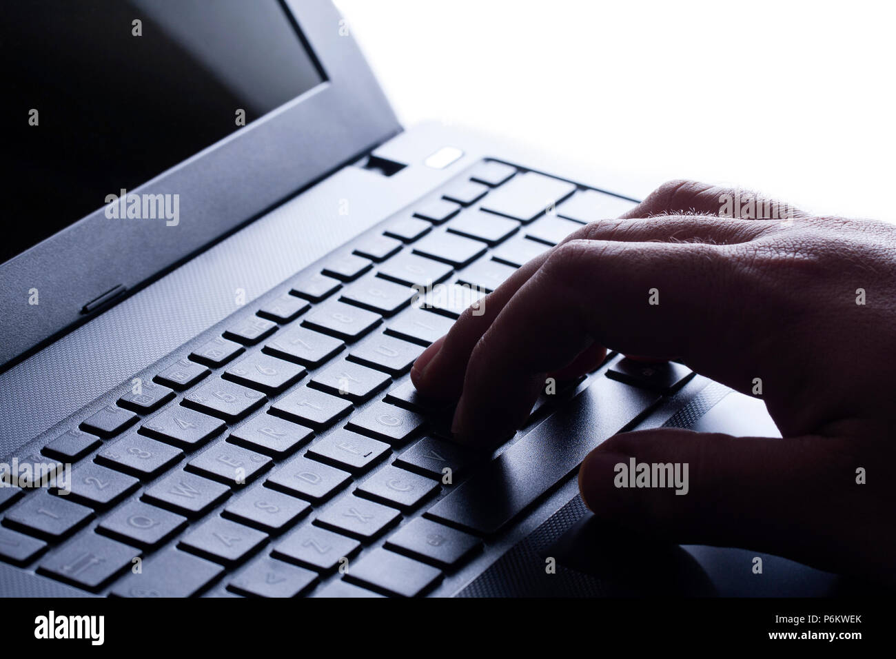 Hand Typing Laptop Keyboard Backlit Stock Photo - Alamy