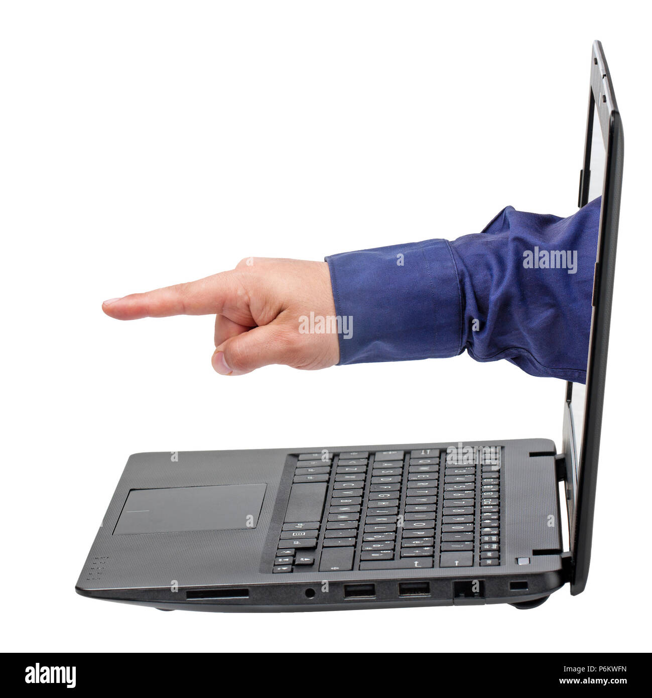 Businessman pointing the finger coming out from laptop display isolated ...
