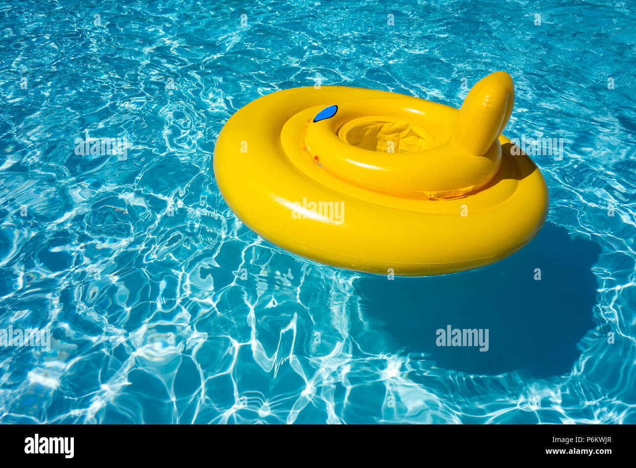 Yellow inflatable pool toy High Resolution Stock Photography and Images ...