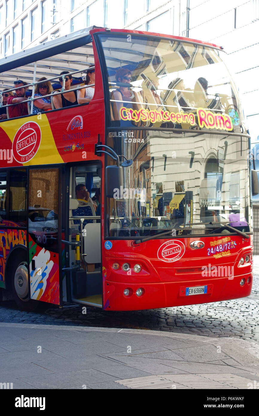 Double decker touristic red bus in the centre of the city of Rome ...