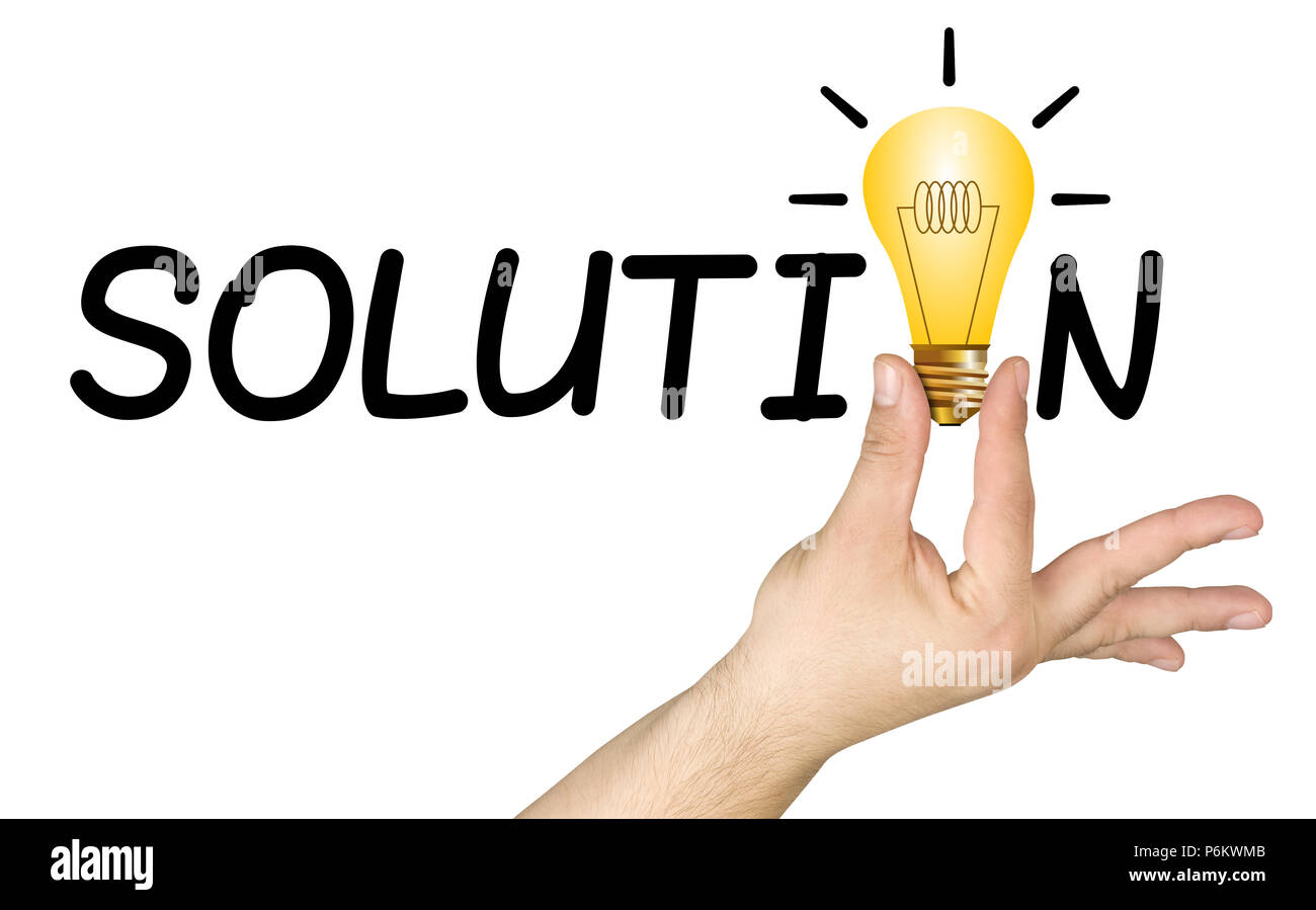 Hand holding drawn light bulb among letters of solution word isolated ...