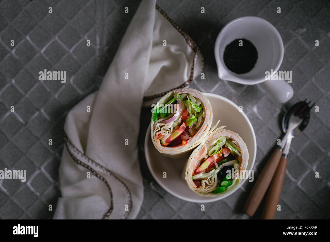 Sandwich Wrap, cross section, table set up Stock Photo - Alamy