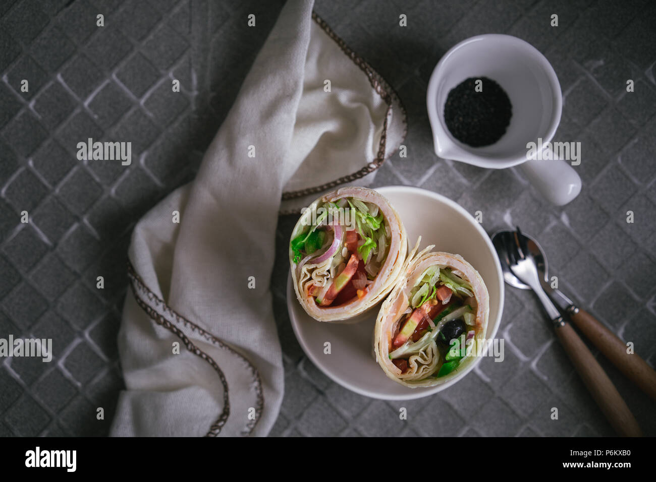 Sandwich Wrap, cross section, table set up Stock Photo - Alamy