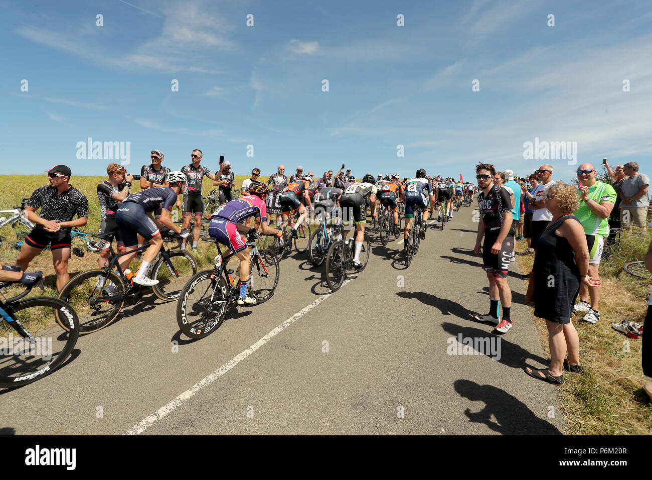 Spectators line the road at the Ryals as the leaders climb during mens ...
